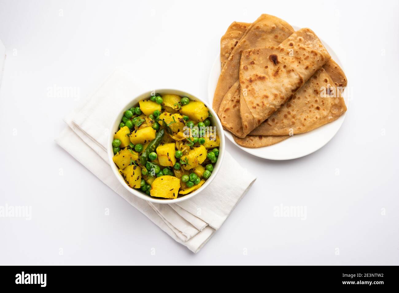 Aloo Mutter or Matar aalu dry sabzi, Indian Potato and green Peas fried ...