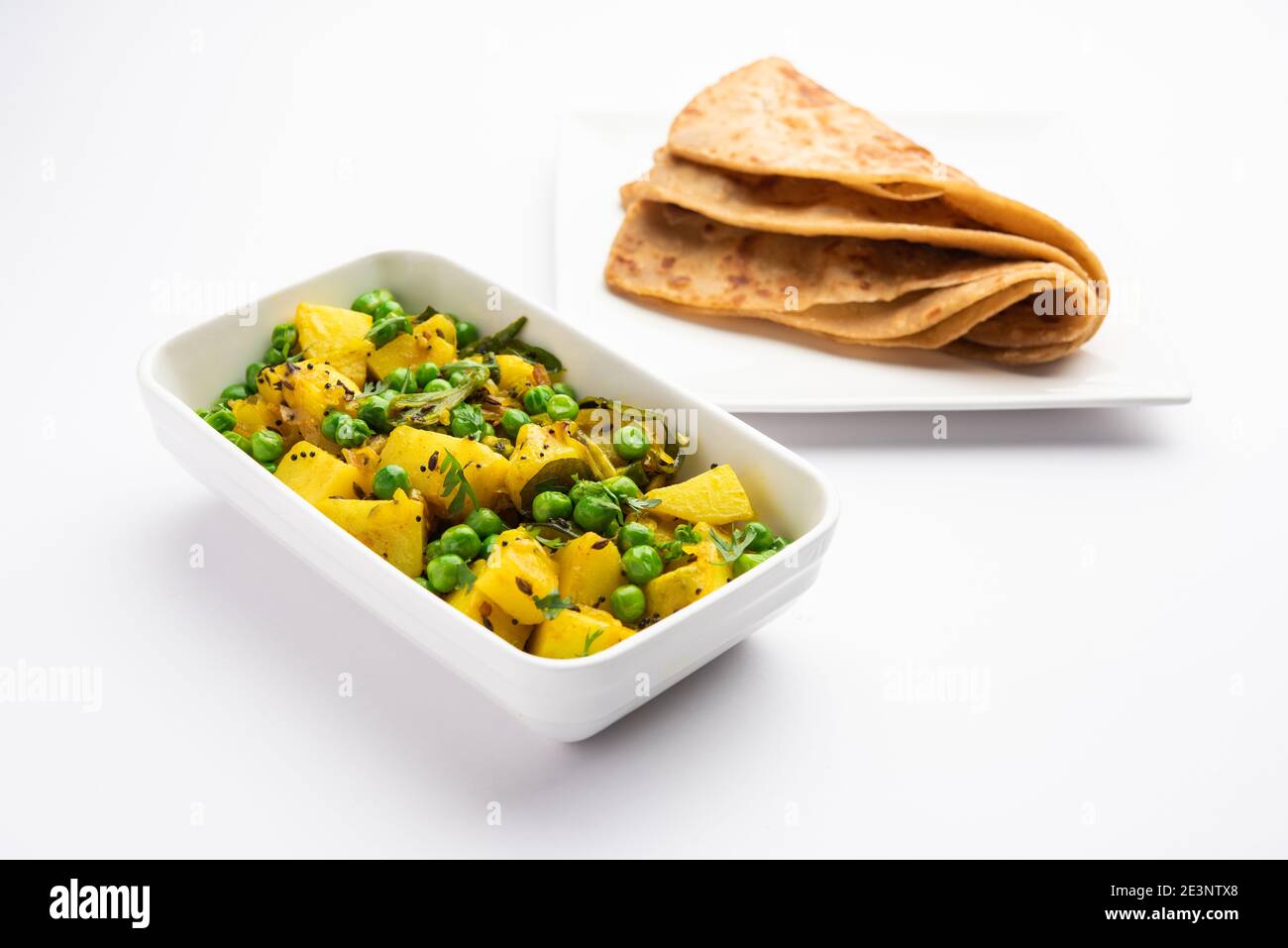 Aloo Mutter or Matar aalu dry sabzi, Indian Potato and green Peas fried ...