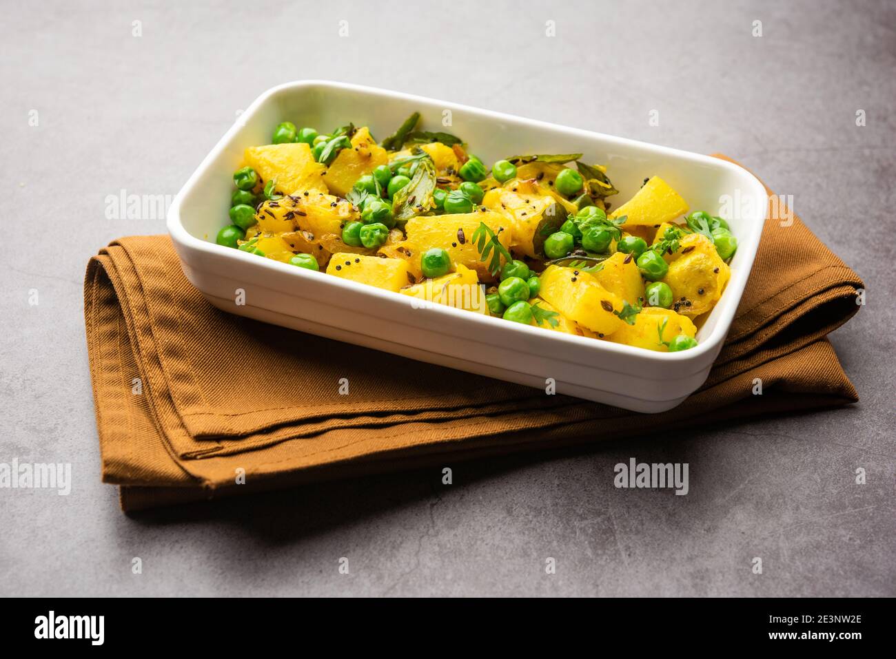 Aloo Mutter or Matar aalu dry sabzi, Indian Potato and green Peas fried ...