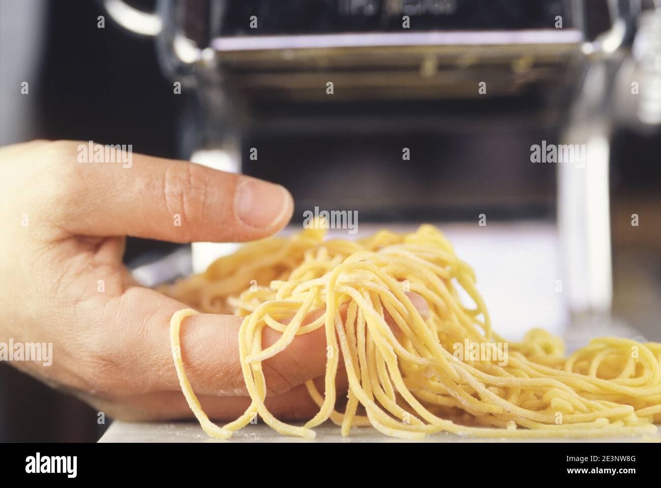 Female hands making pasta hi-res stock photography and images - Alamy