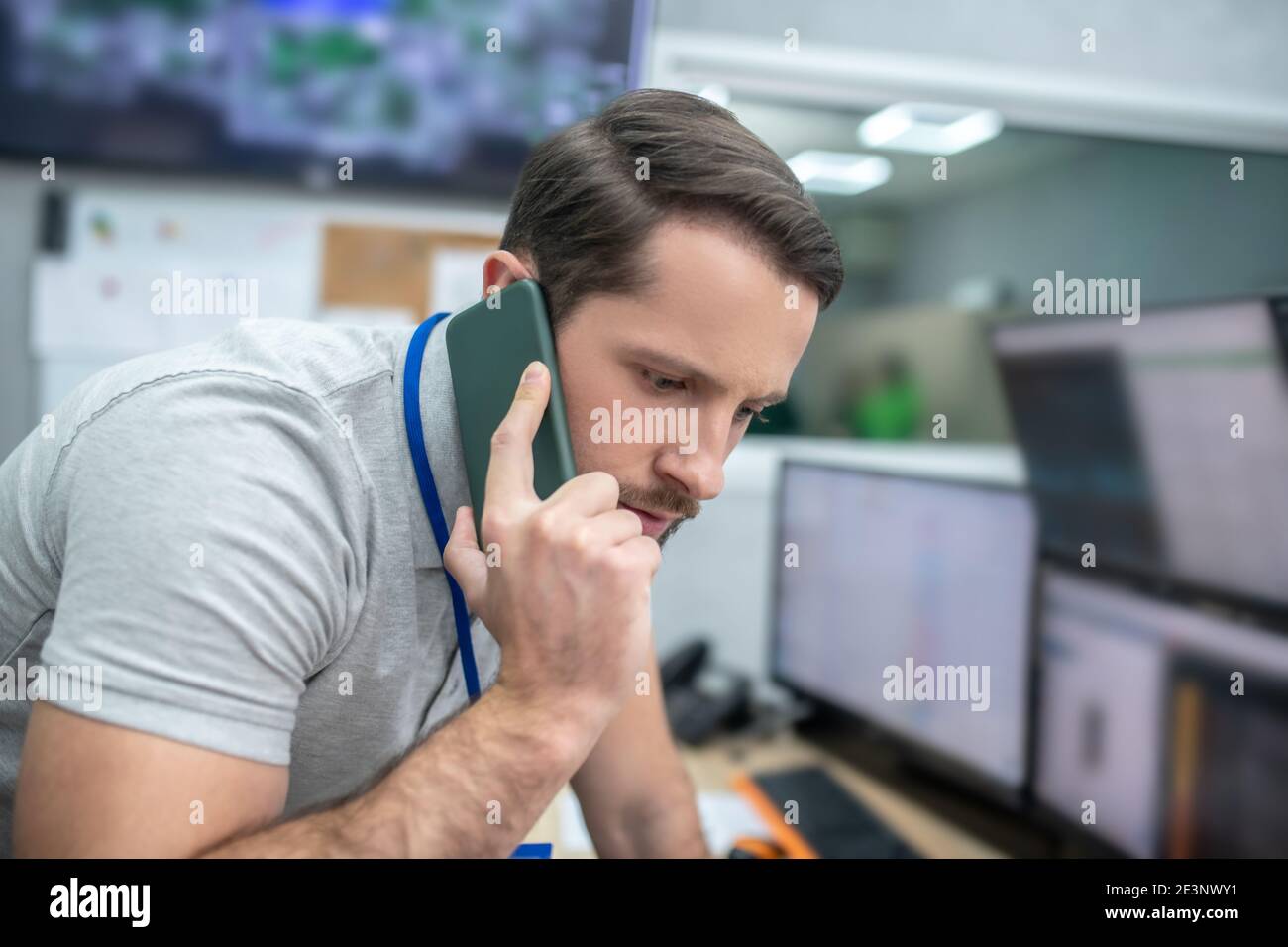 Attentive man receiving important information by smartphone Stock Photo ...