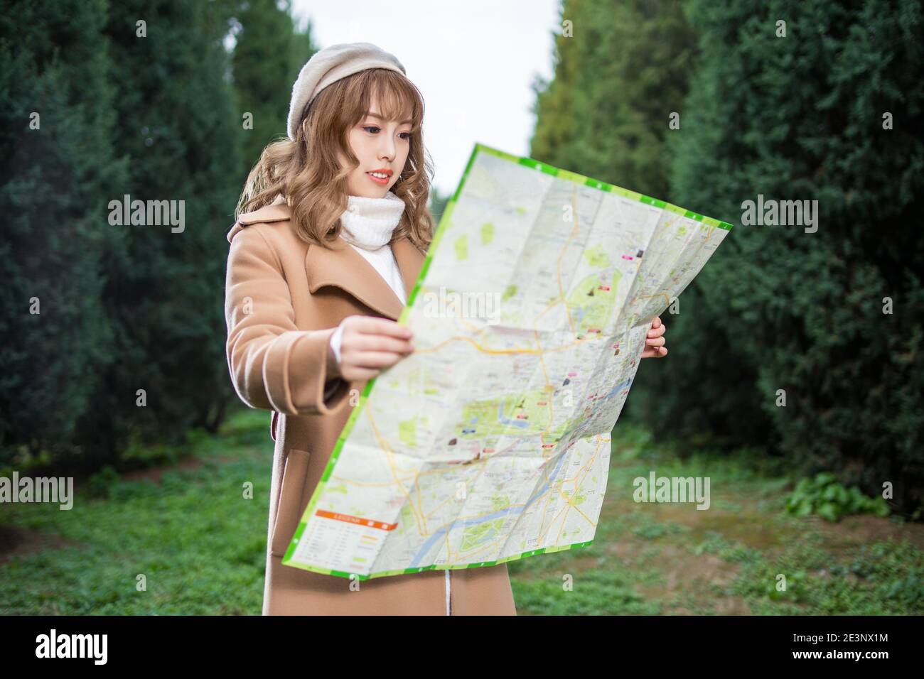 Autumn woman map directions hi-res stock photography and images - Alamy
