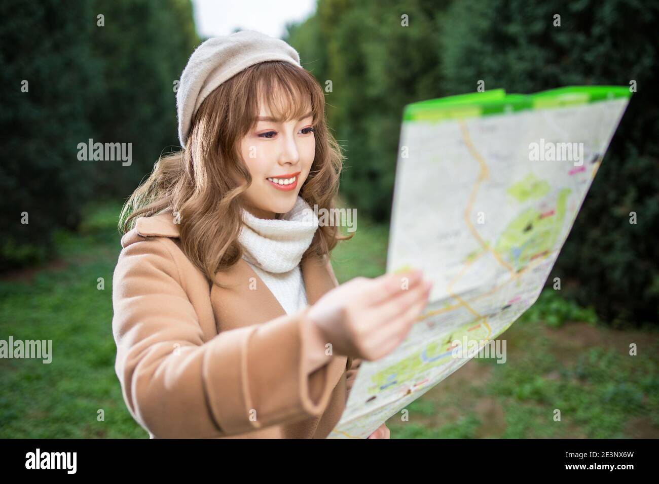 Autumn woman map directions hi-res stock photography and images - Alamy