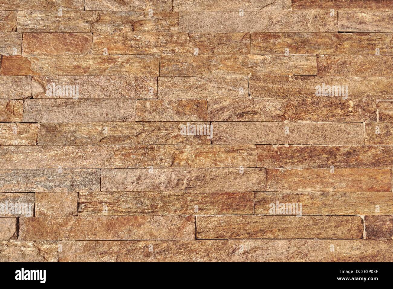 Decorative stone tile wall surface as background Stock Photo - Alamy