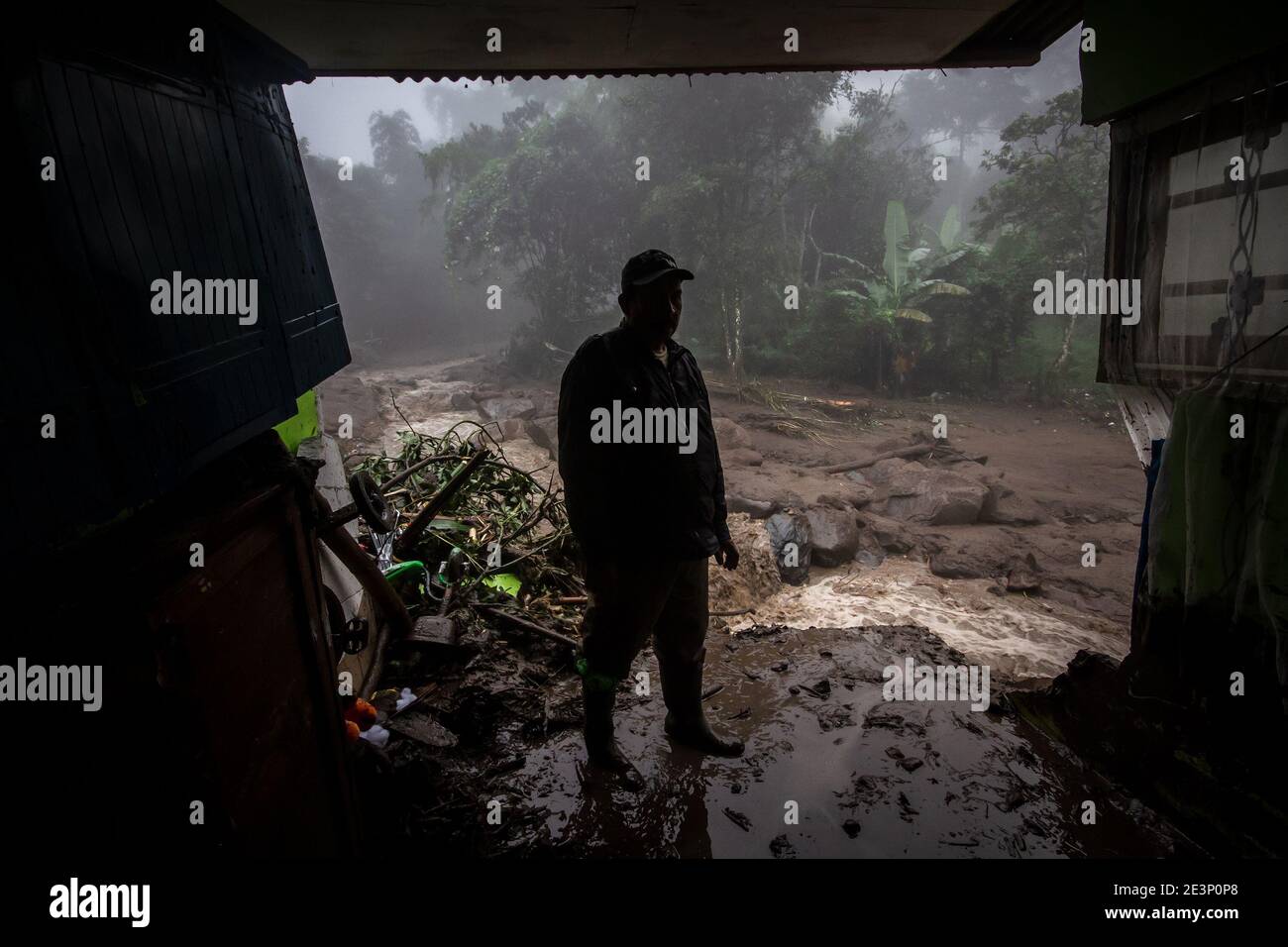Bogor, West Java, Indonesia. 20th Jan, 2021. A number of houses were buried in mud after flash ...