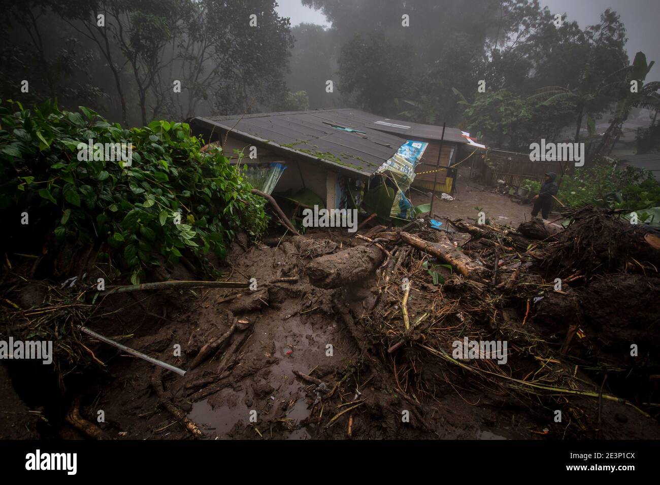 Bogor, West Java, Indonesia. 20th Jan, 2021. A number of houses were buried in mud after flash ...