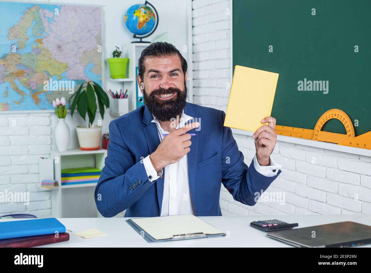 man with beard and moustache look as businessman or teacher in college ...