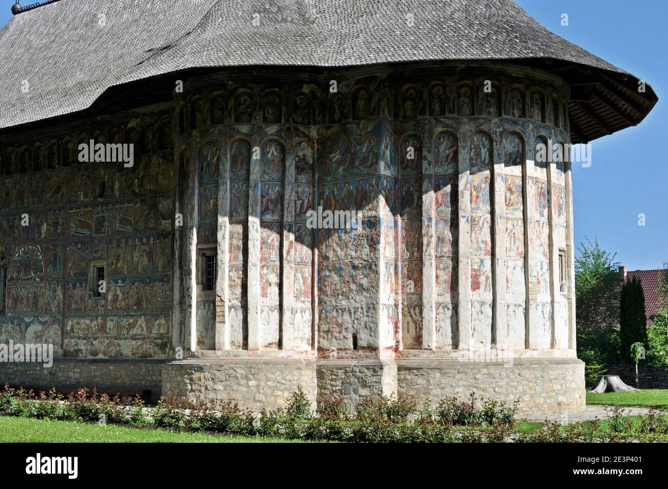Side view of an old painted facade church Stock Photo - Alamy