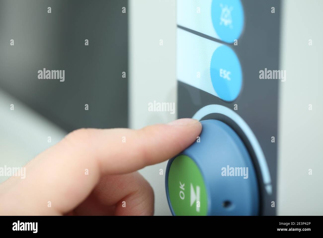 Hand rotating regulation knob, concept of technical support worker ...