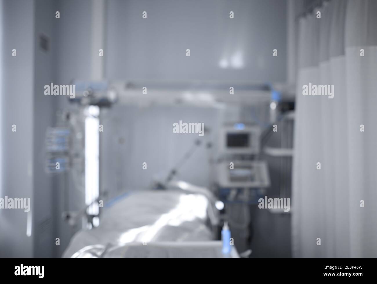 ER with bed and equipment Background defocused picture Stock Photo - Alamy