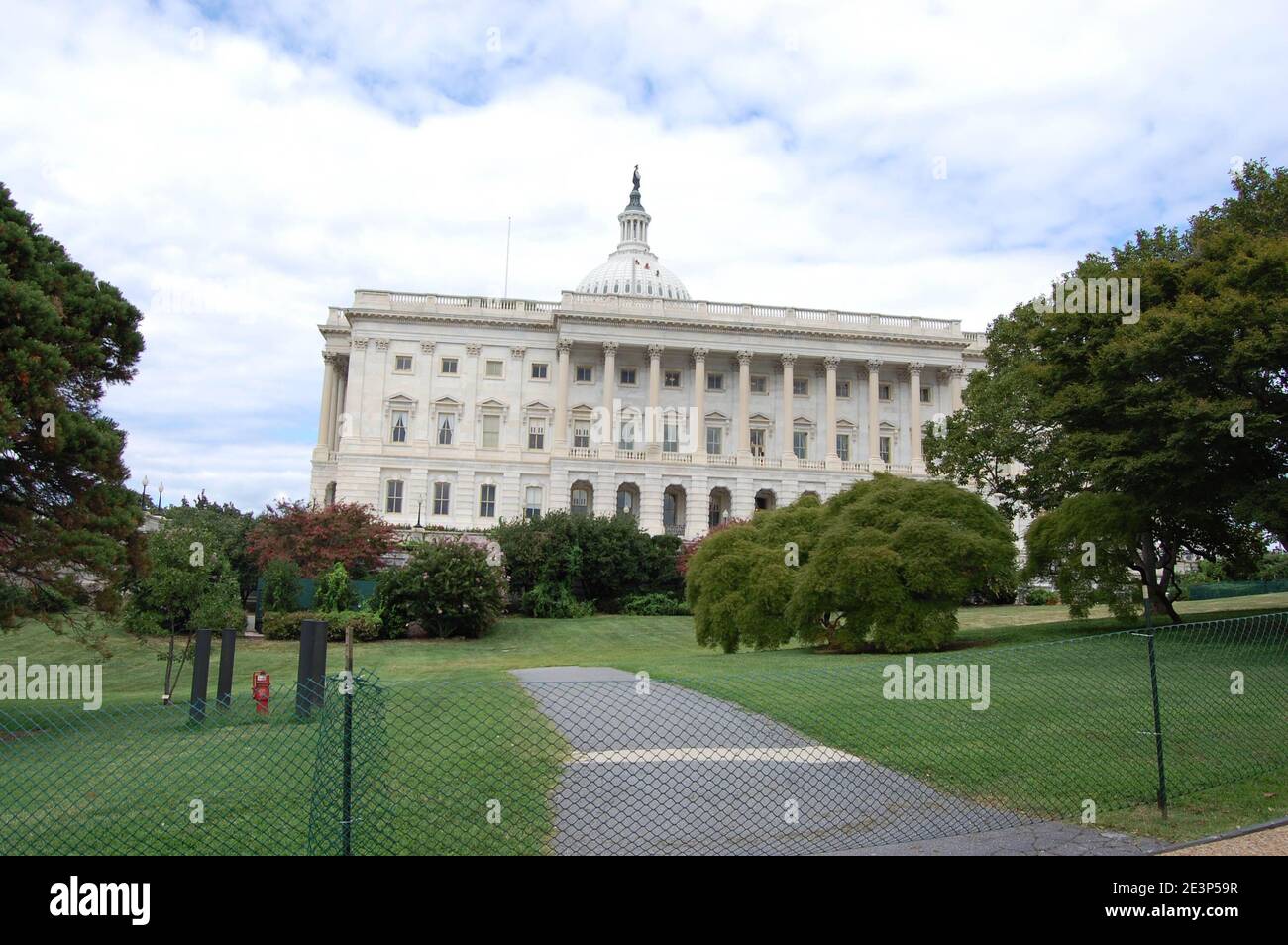 Rear of The Capital Building Washington DC USA dome trees tree garden ...