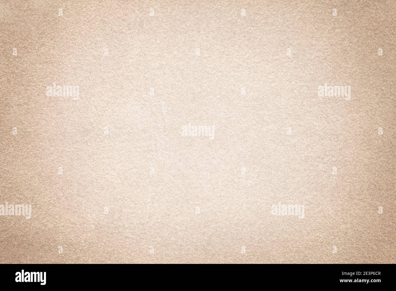 Beige matte background of suede fabric with vignette, closeup. Velvet ...