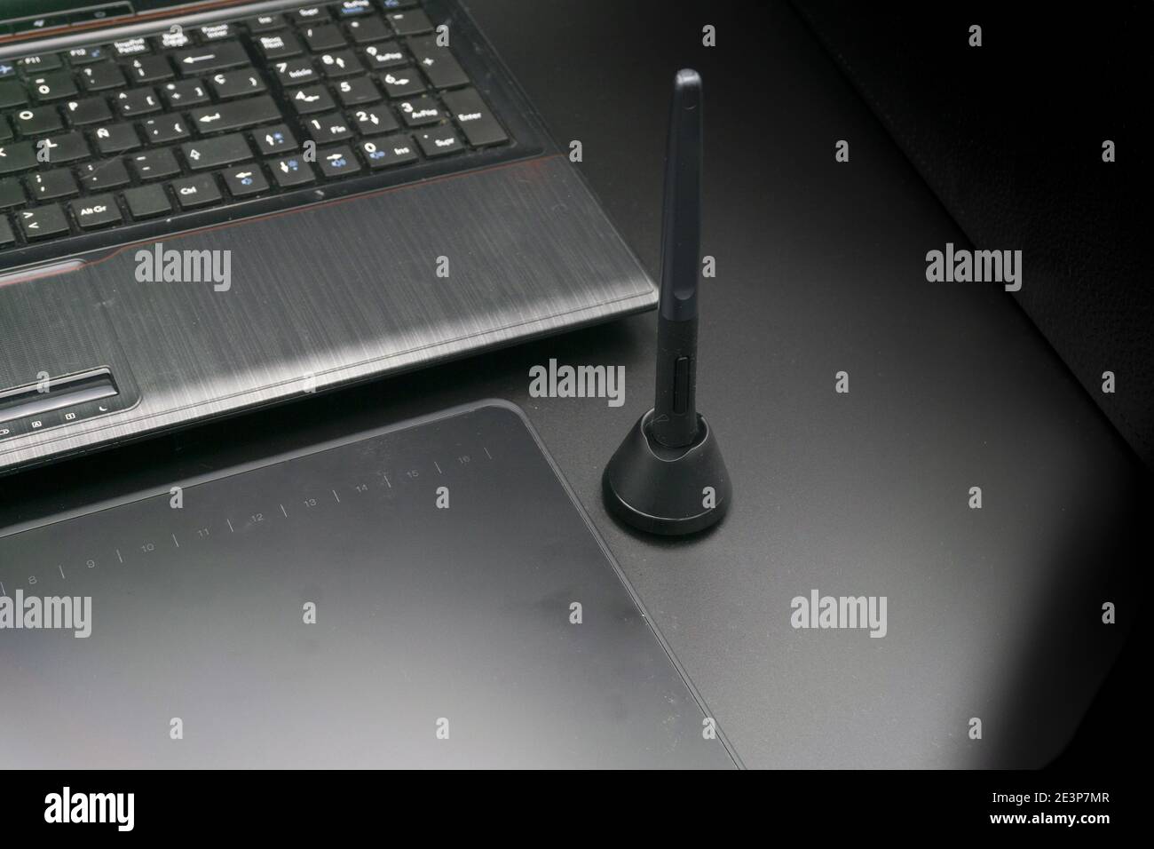 workspace with graphic tablet digital pen and laptop. digital work ...