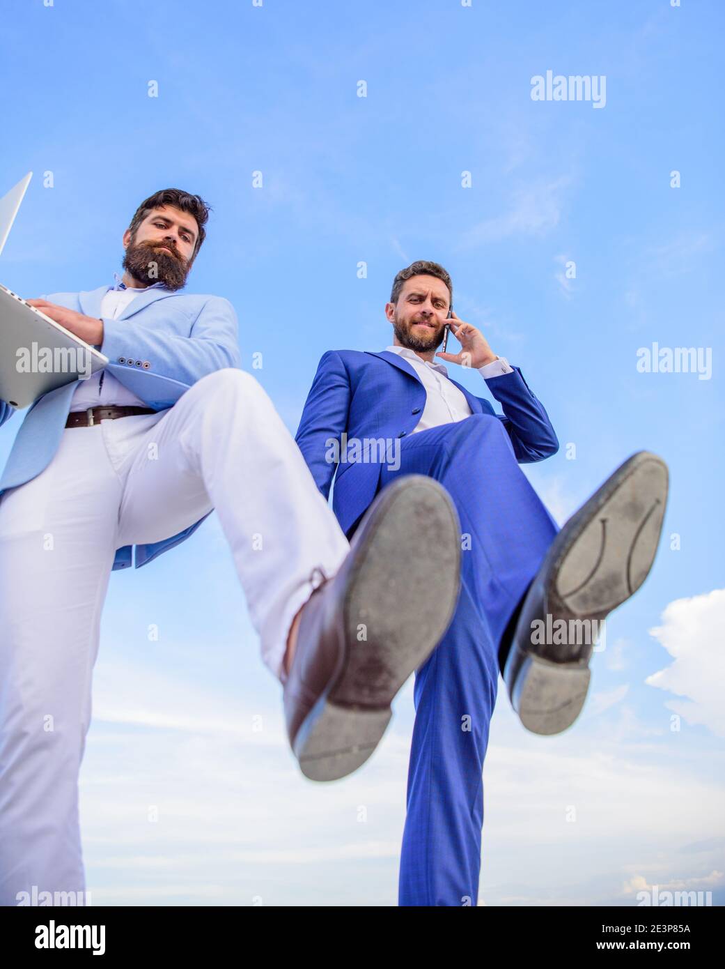 Businessmen making step bottom view. Business technologies coming ...