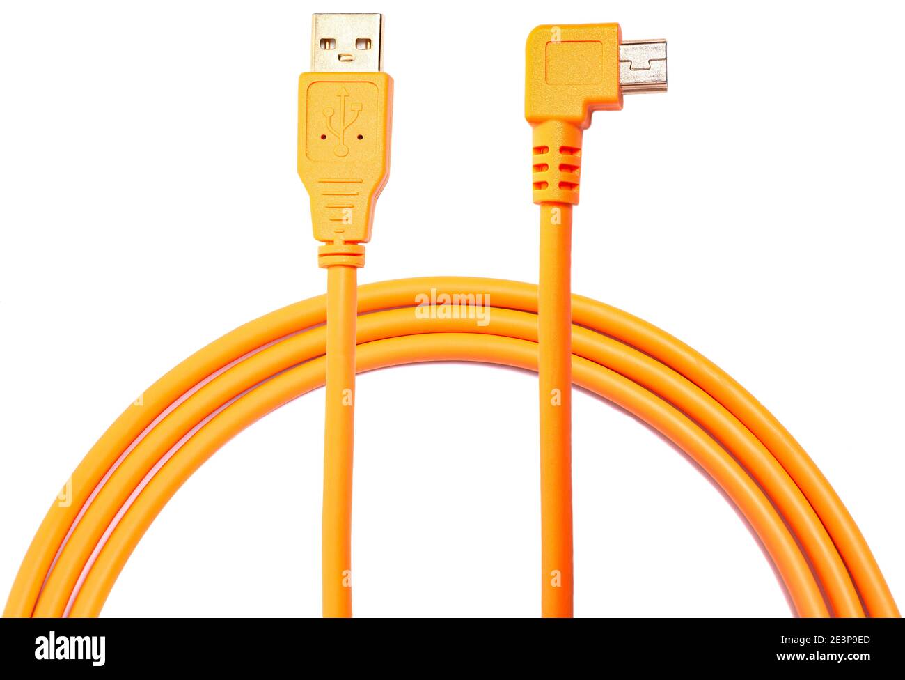 Orange rolled USB cable isolated on white background Stock Photo - Alamy