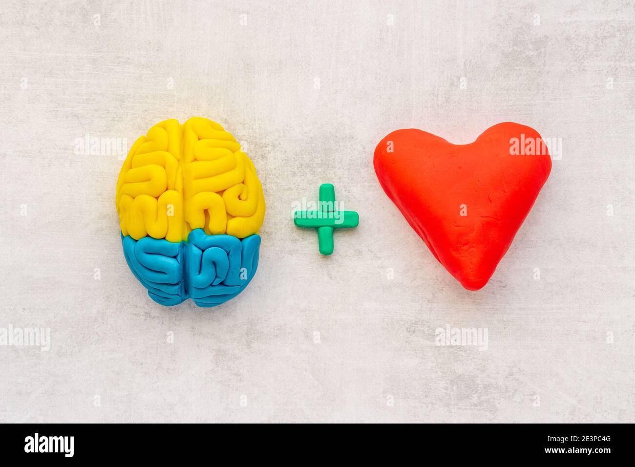 Think with love - heart and brain concept, top view Stock Photo - Alamy