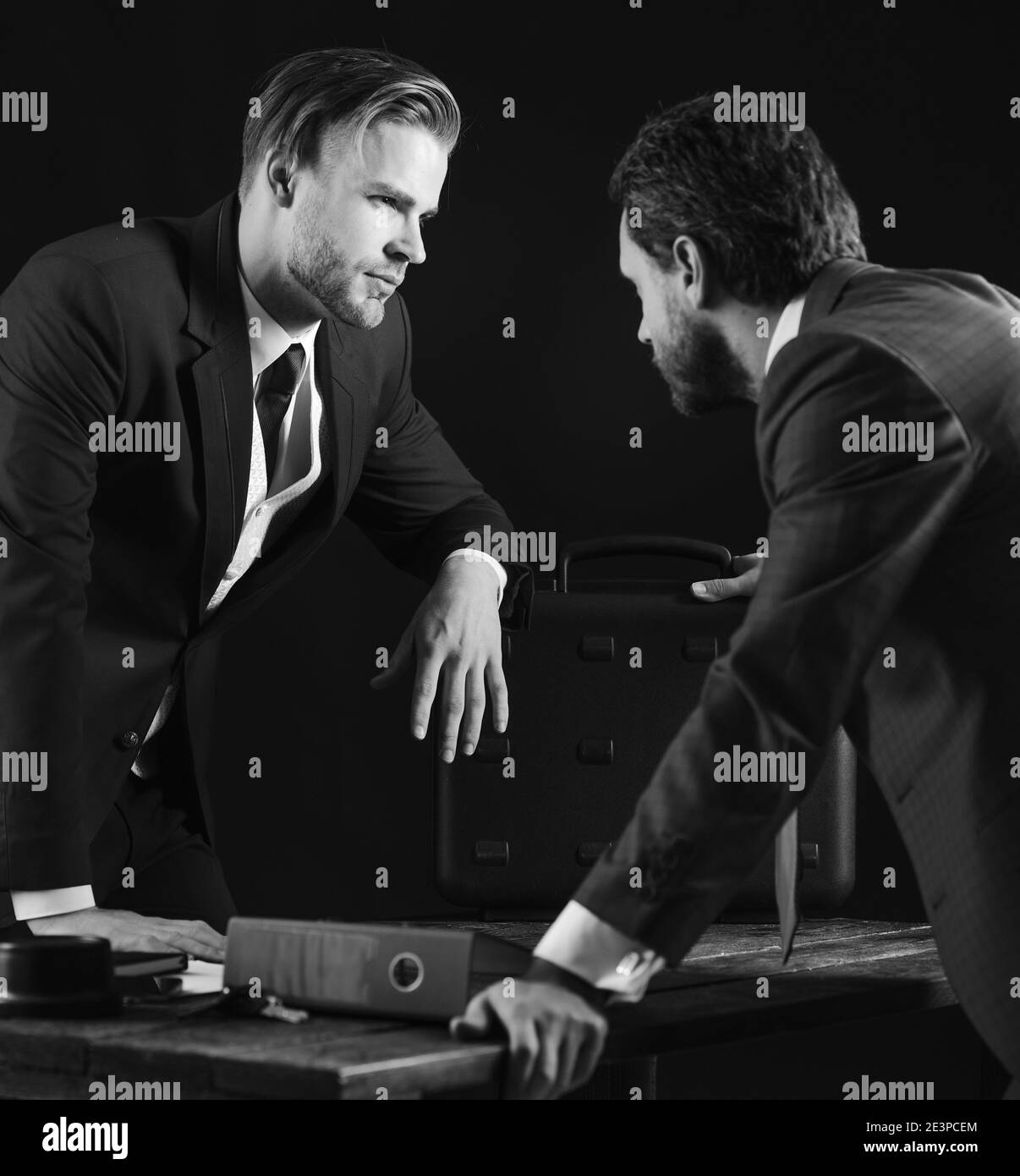 Businessmen with documents and briefcase ready for exchange. Business ...