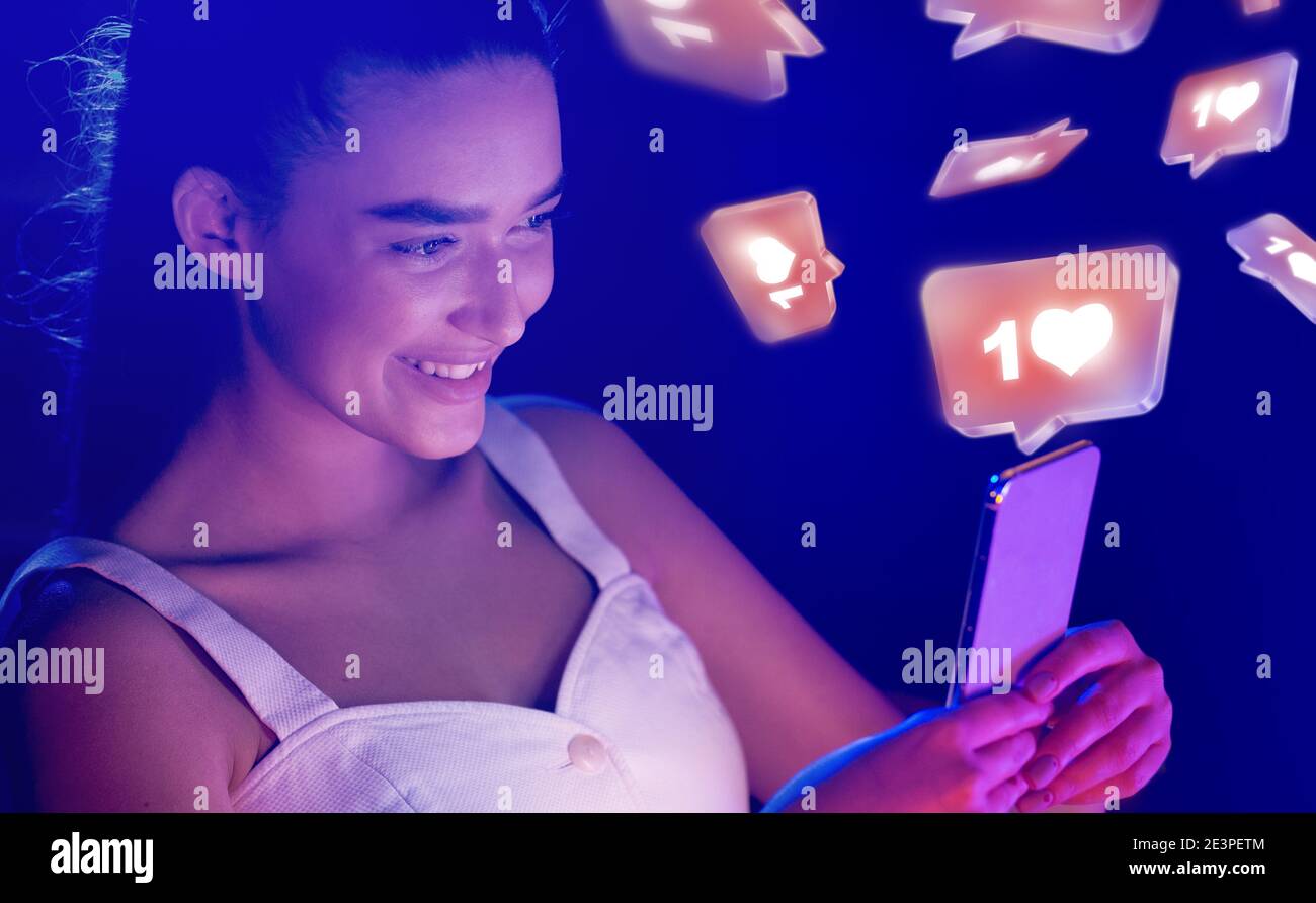 Joyful Lady Using Mobile Phone With Like Icons Networking Indoor Stock ...