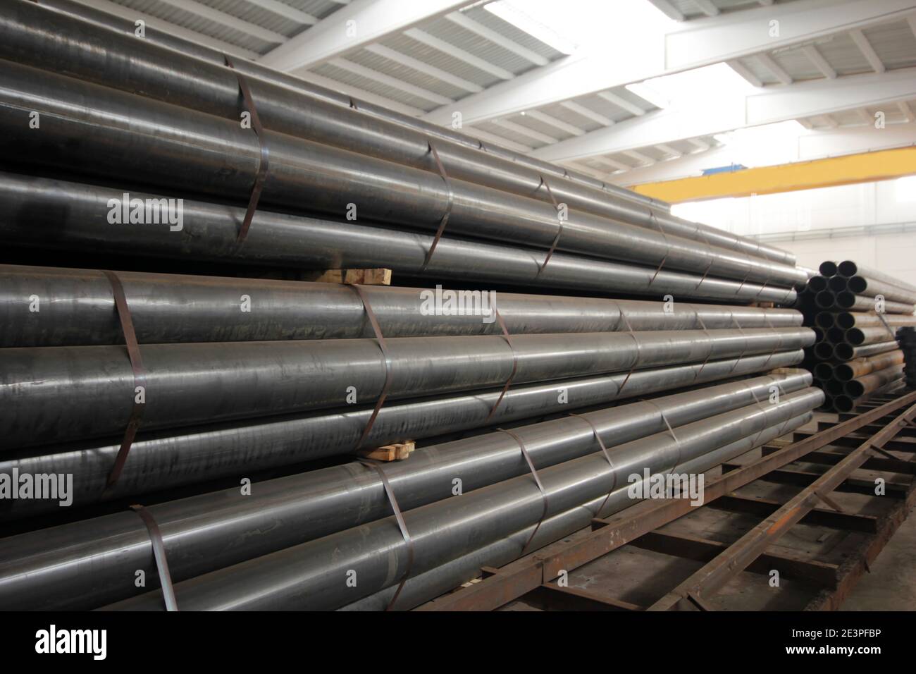 steel metal pipe stack inside factory Stock Photo - Alamy