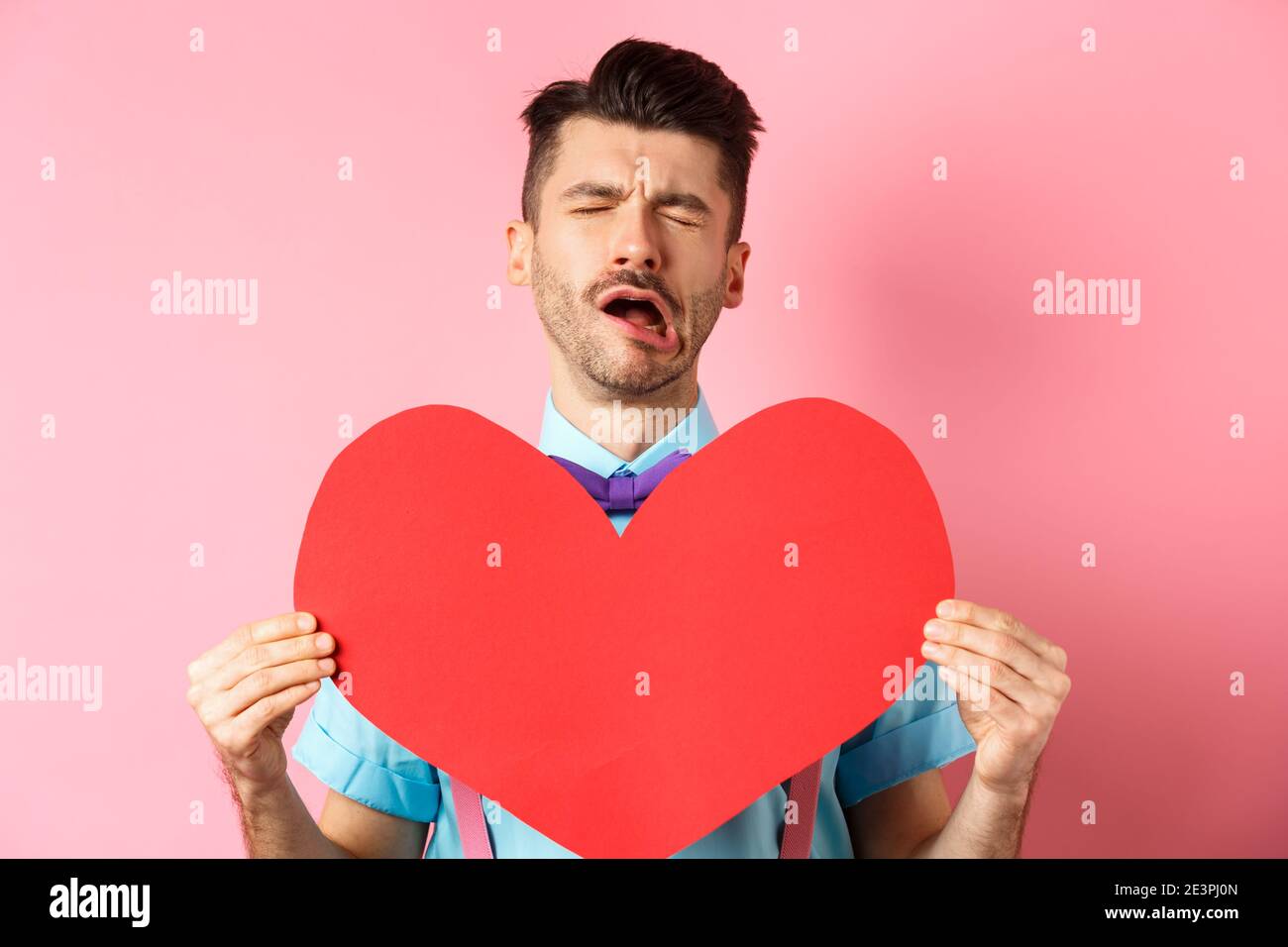 Valentines day concept. Sad and lonely man feeling heartbroken, being ...