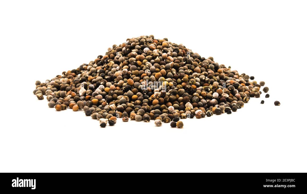 Mound of homegrown okra seeds isolated on white background. Organic and ...