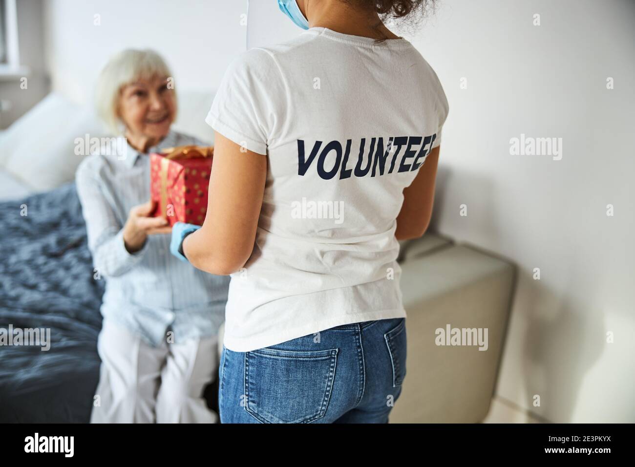 Senior lady receiving package hi-res stock photography and images - Alamy