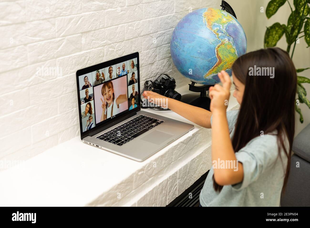 cheerful young little girl children using laptop computer, studying ...