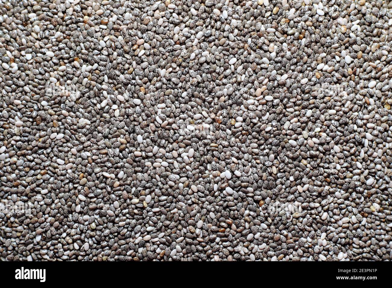 Background view of lots of white and black chia seeds Stock Photo - Alamy