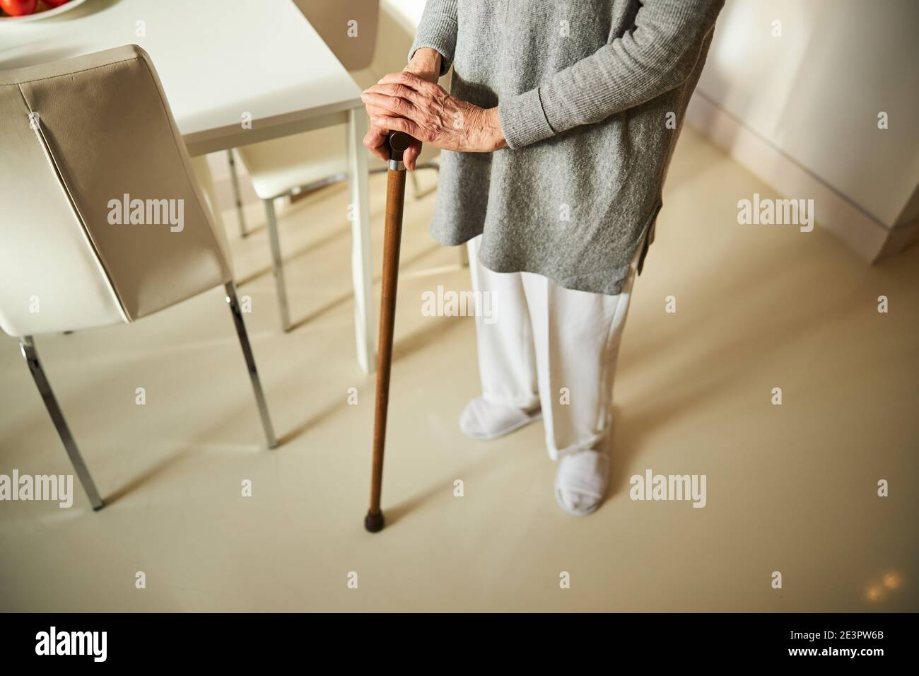 Senior woman using cane hi-res stock photography and images - Alamy
