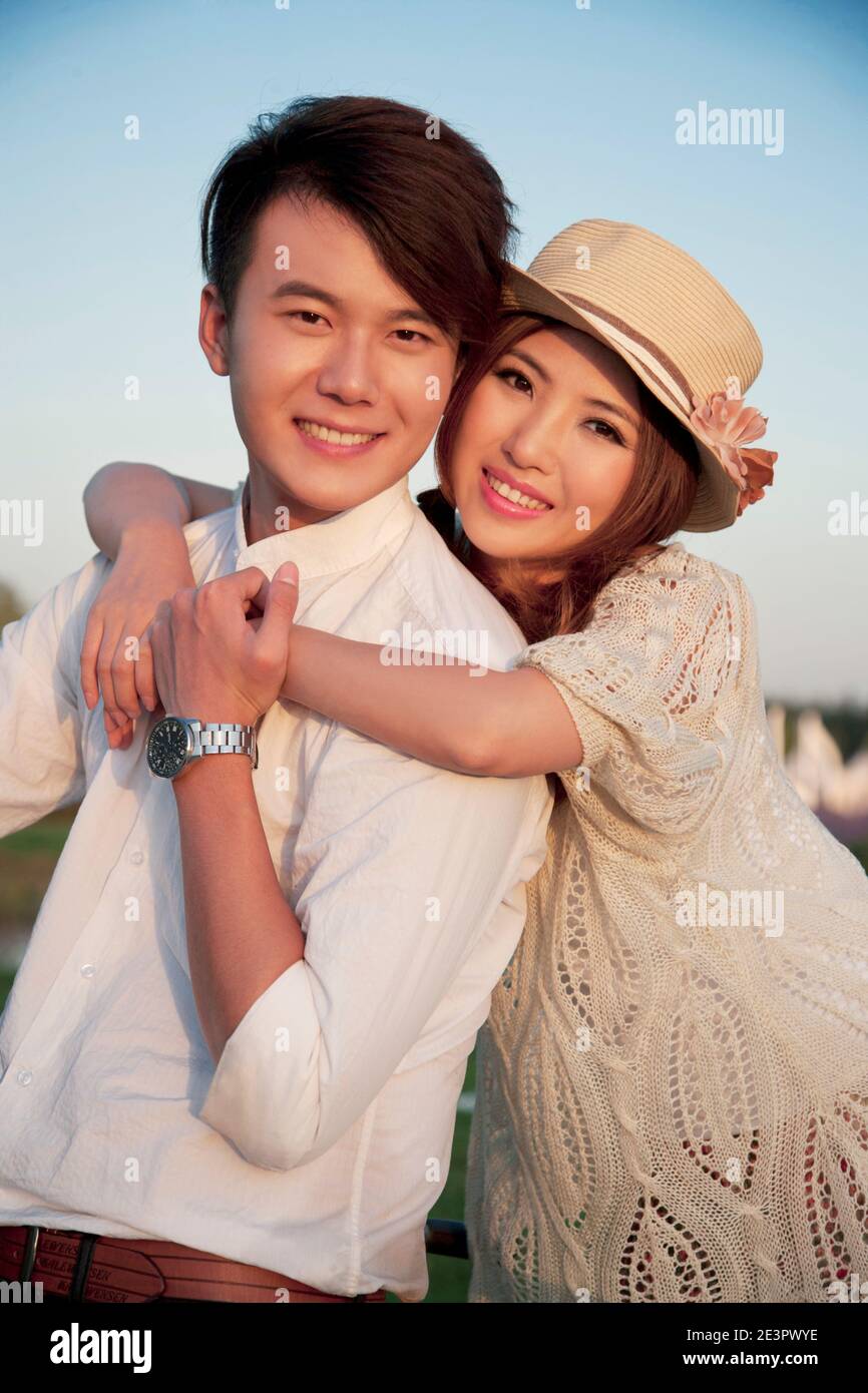 The young couple cuddling together high quality photo Stock Photo - Alamy