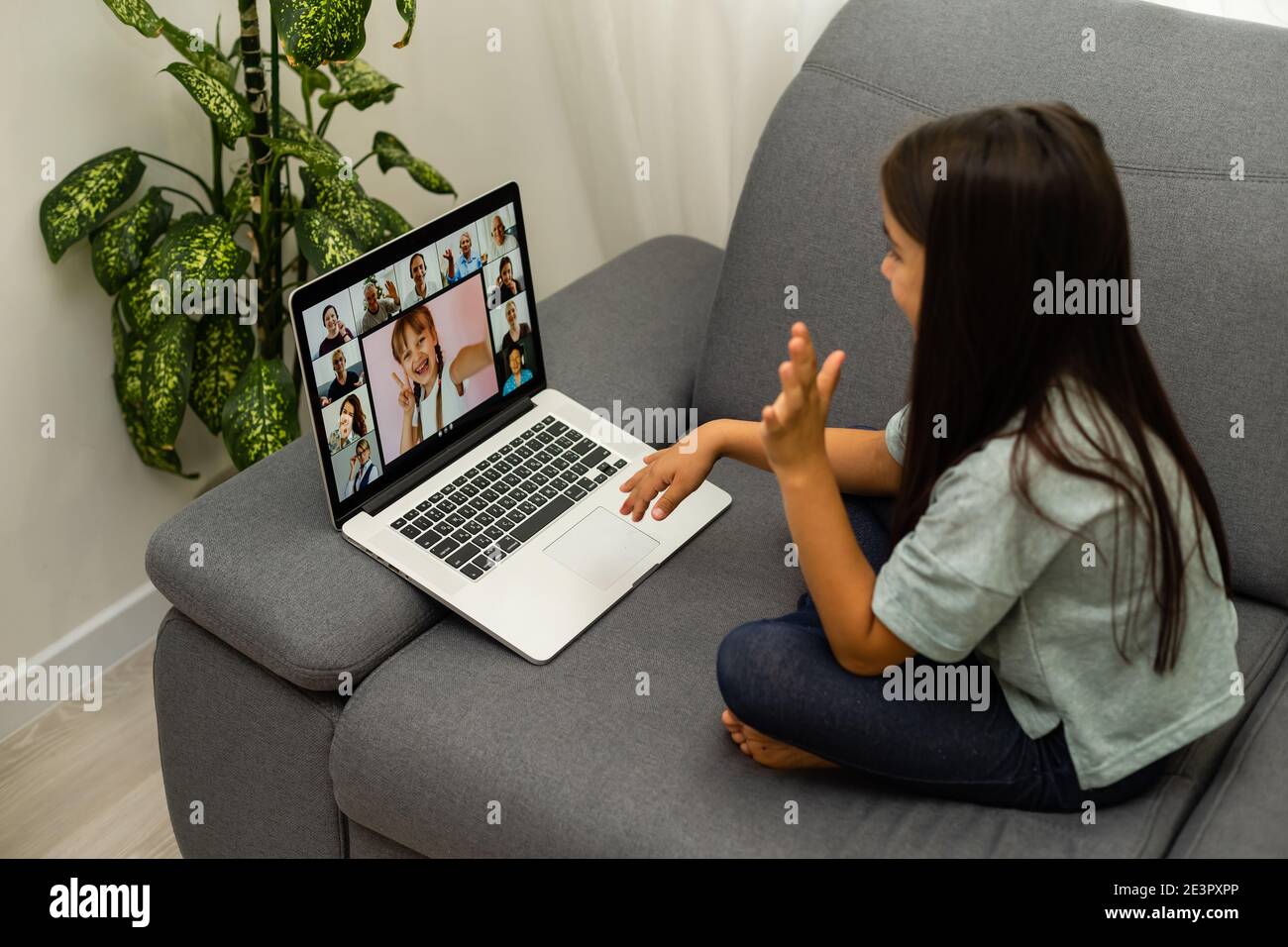 cheerful young little girl children using laptop computer, studying ...