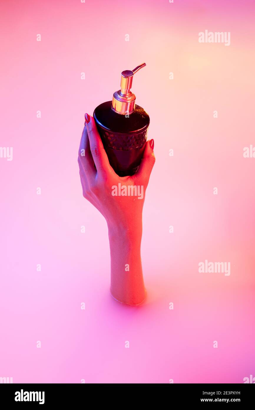 Close up female hand gesturing from the milk bath with soft white ...