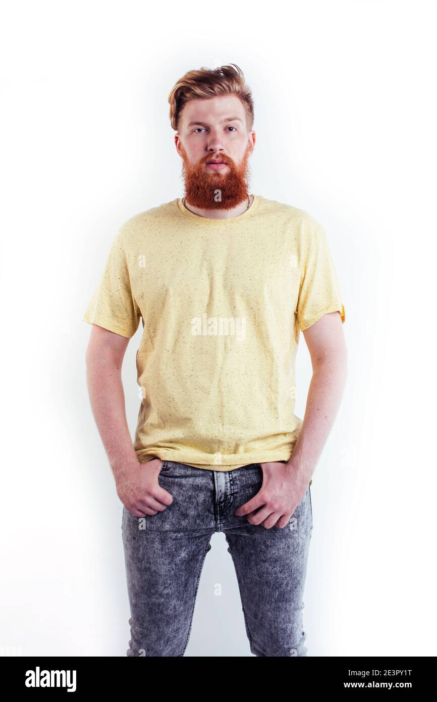 young handsome hipster ginger bearded guy looking brutal isolated on ...