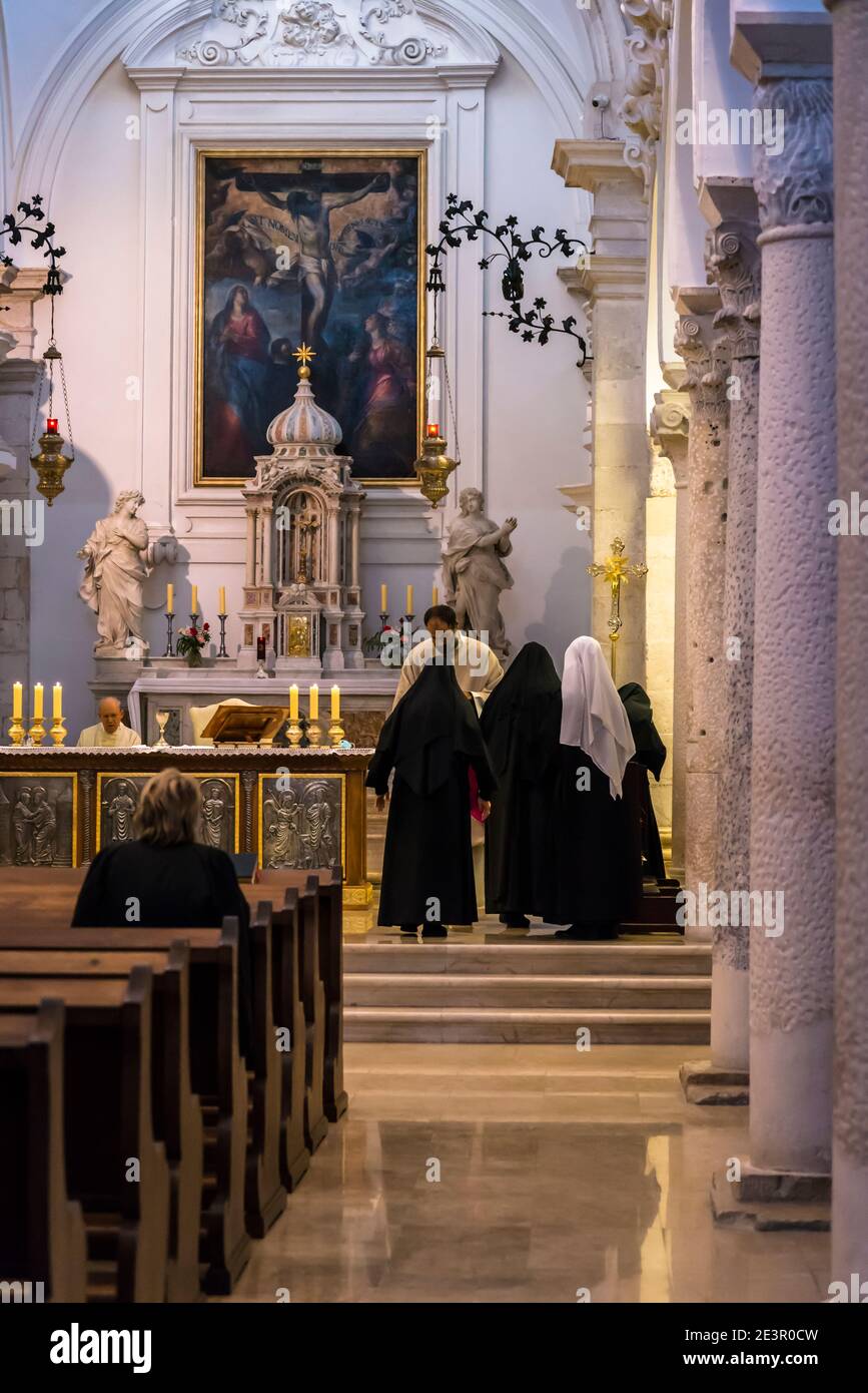 Nuns attending the morning mass in the Church of St. Mary and ...