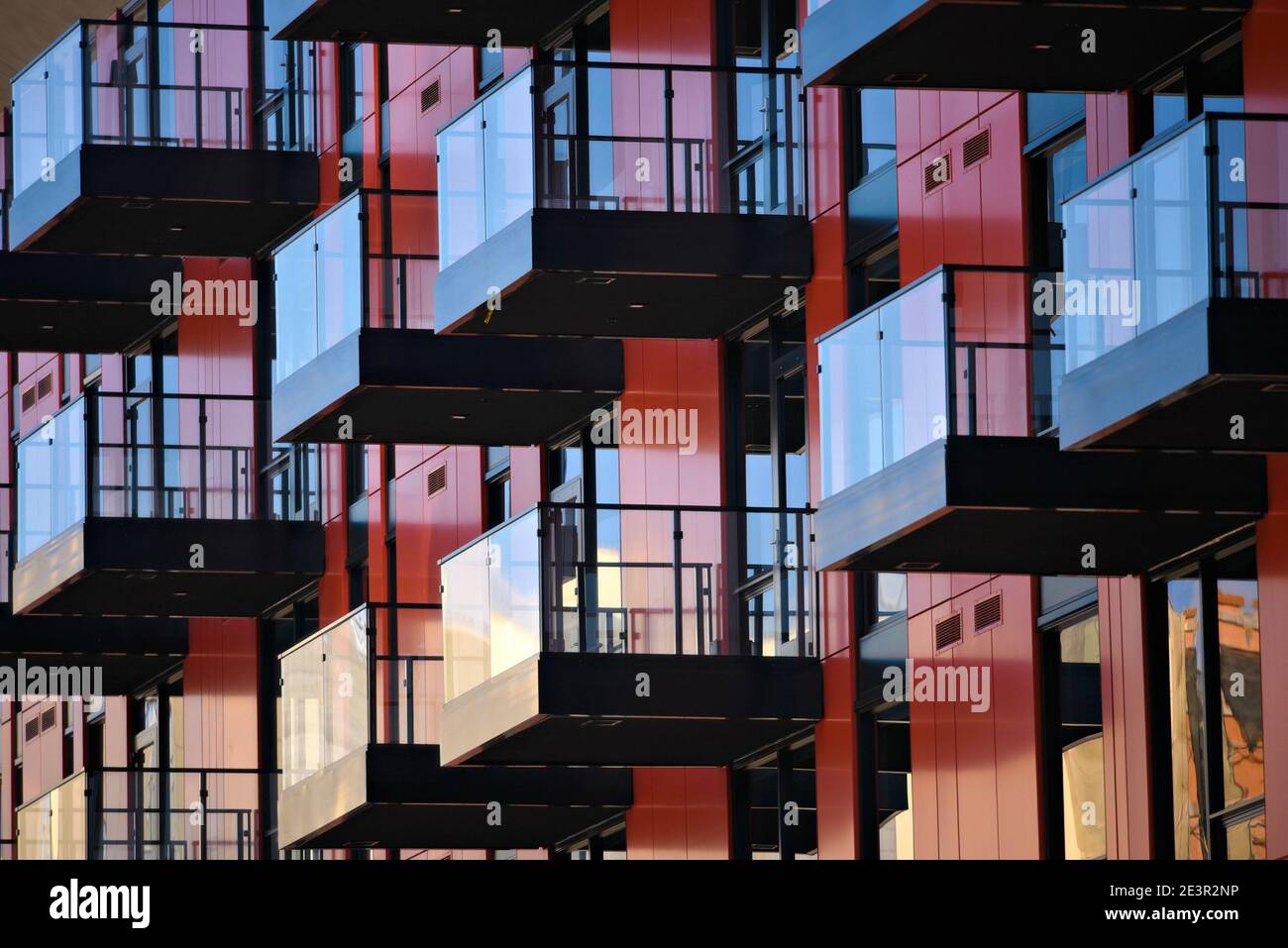 Modern corporate offices high-rise building with red and black ...