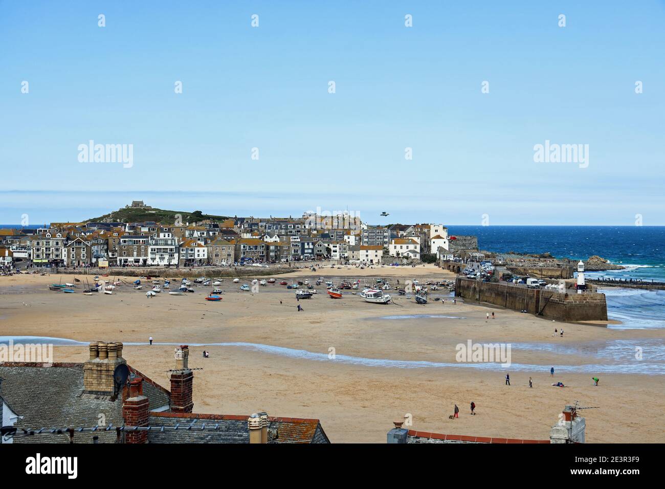 The busy harbour community at the harbourside St Ives, The tide is out ...