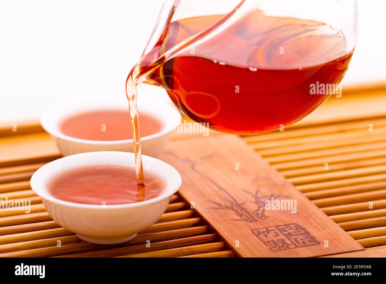 Tea pouring into tea cup high quality photo Stock Photo - Alamy