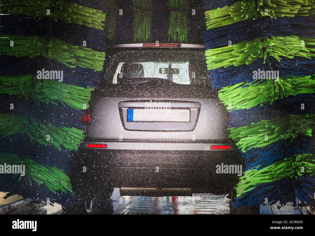 Grey car during washing process Stock Photo - Alamy