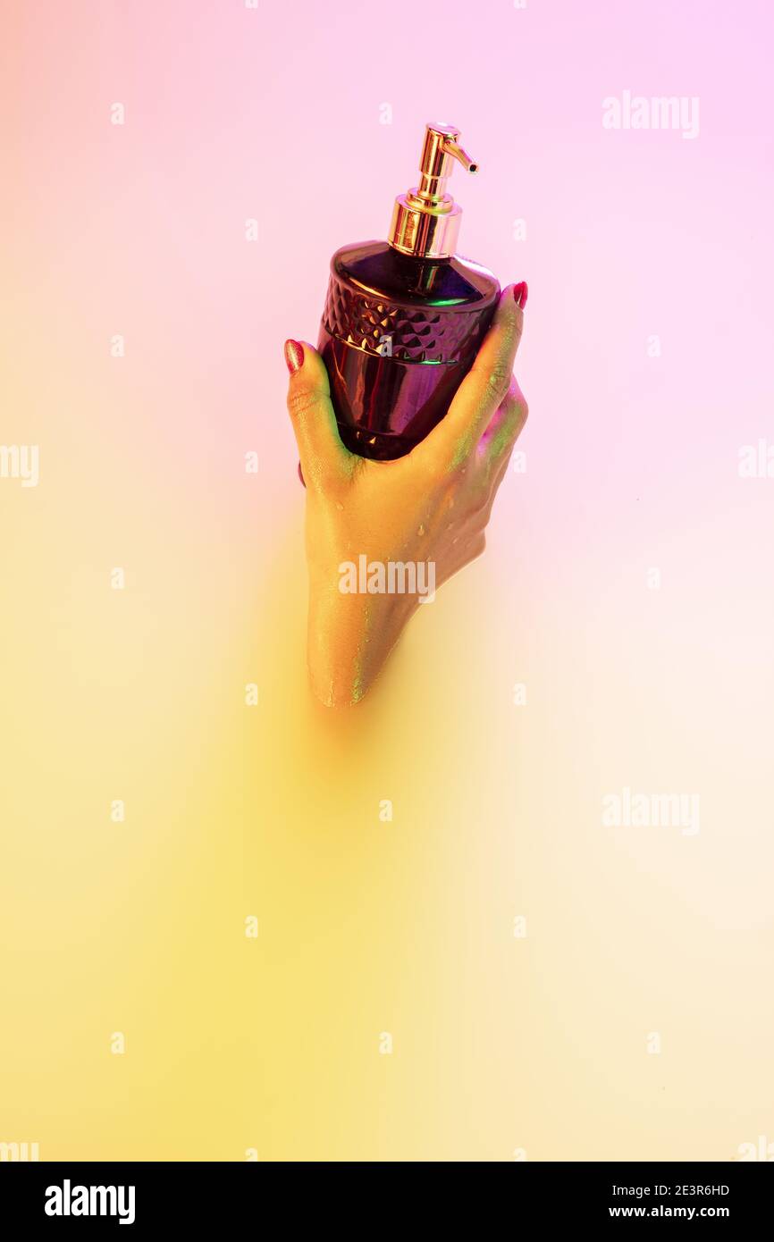 Cleaning. Close up female hand gesturing from the milk bath with soft ...