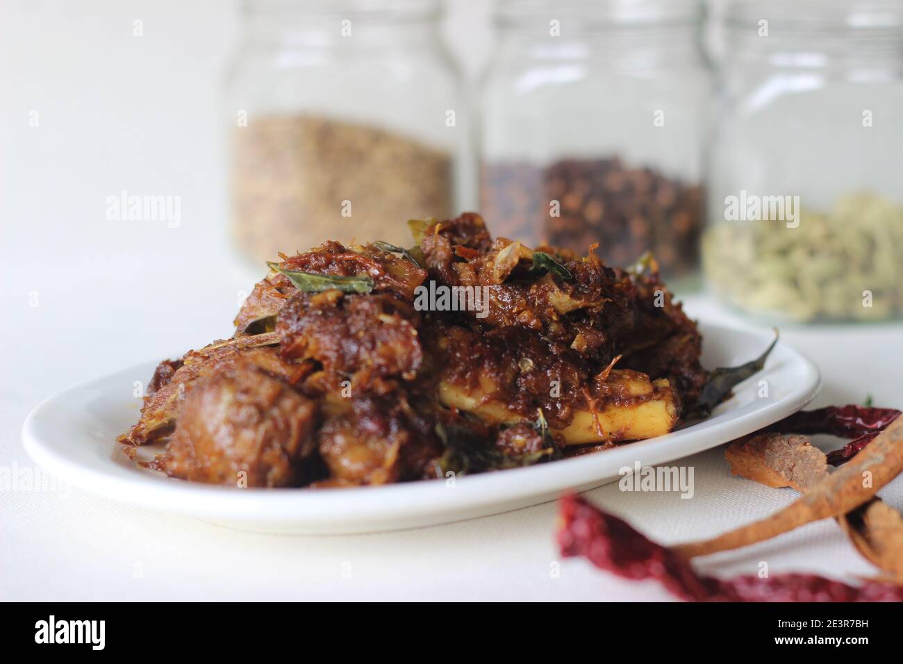 Spicy mutton roast prepared in Kerala style for special occasions like ...
