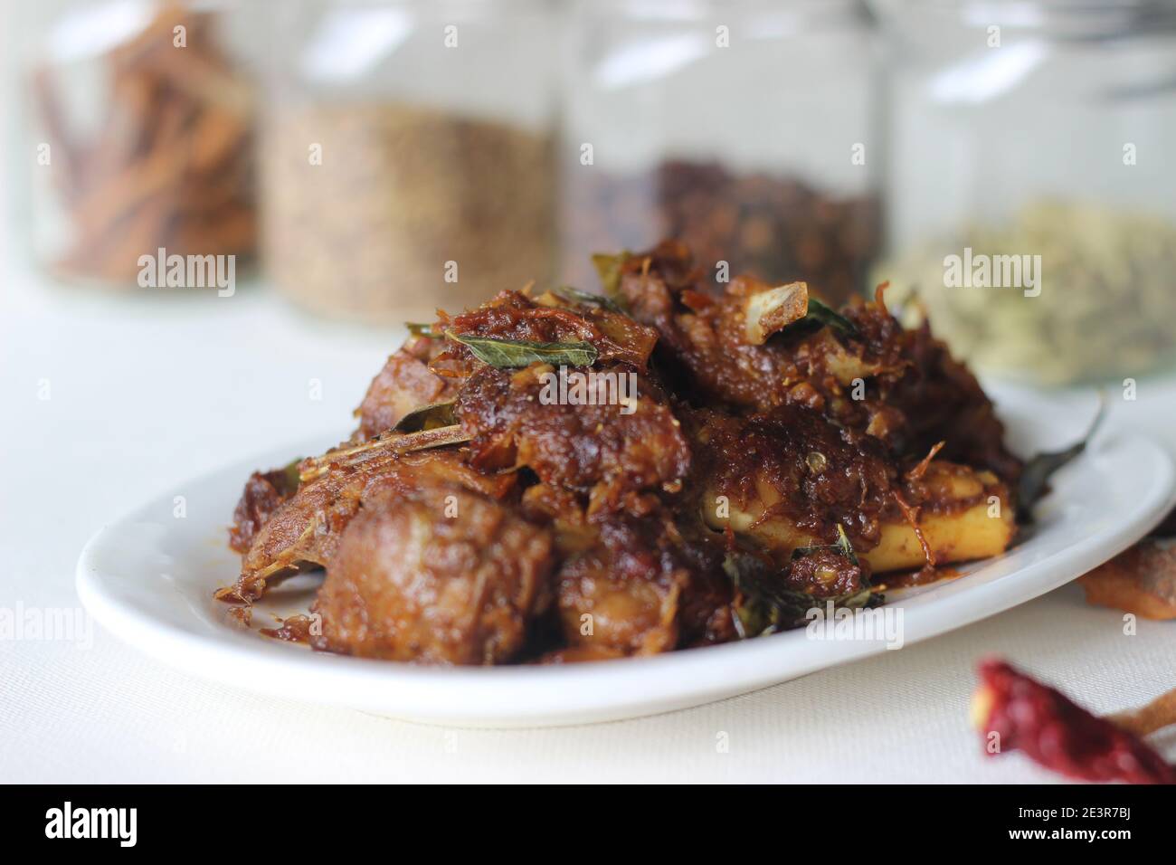Spicy mutton roast prepared in Kerala style for special occasions like ...