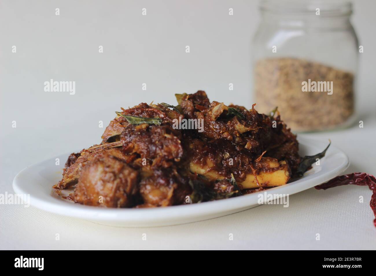 Spicy mutton roast prepared in Kerala style for special occasions like ...