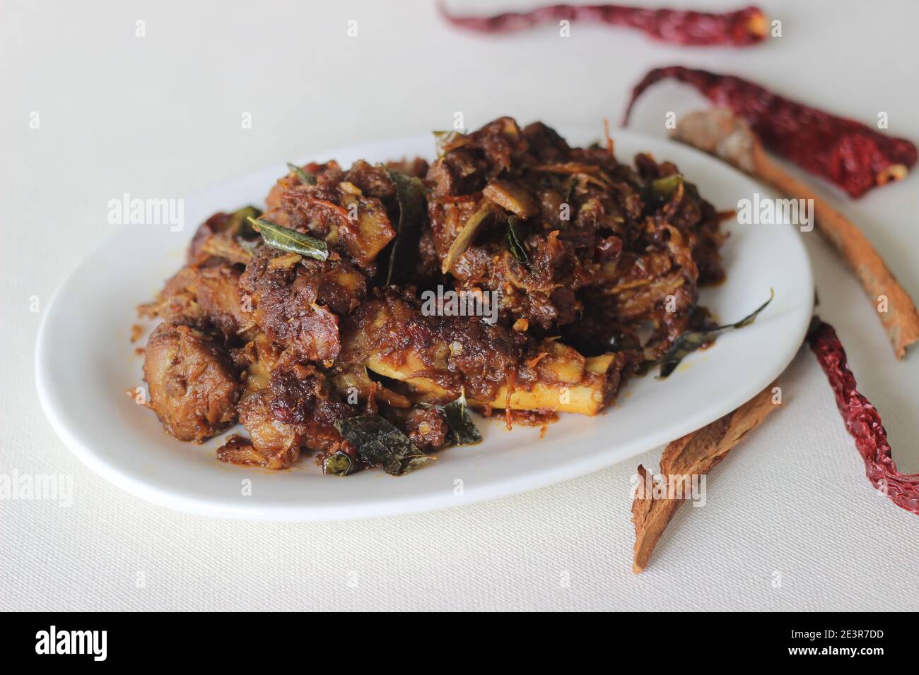 Spicy mutton roast prepared in Kerala style for special occasions like ...
