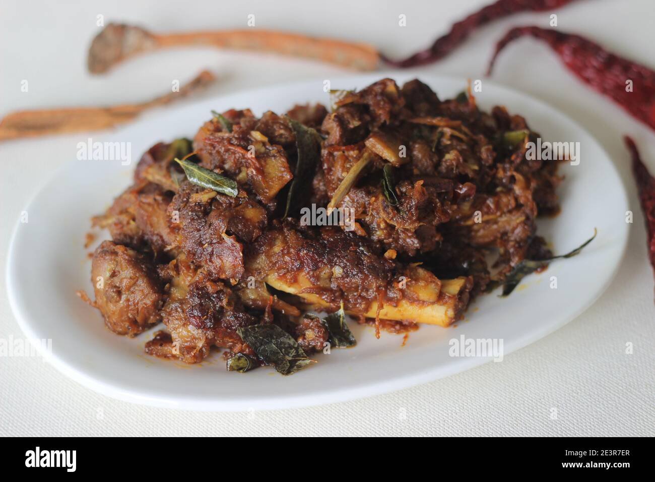 Spicy mutton roast prepared in Kerala style for special occasions like ...