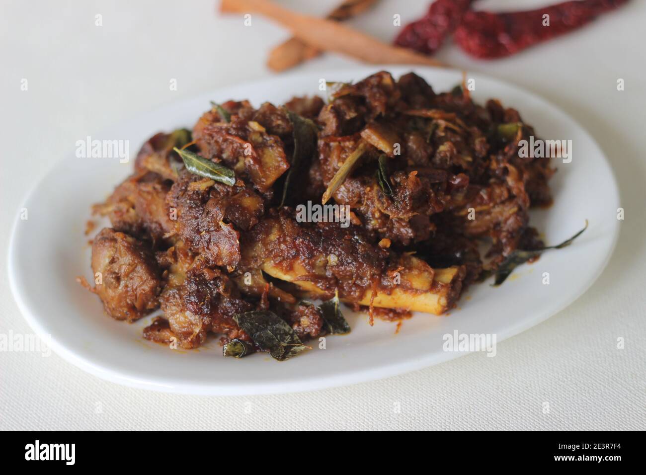 Spicy mutton roast prepared in Kerala style for special occasions like ...