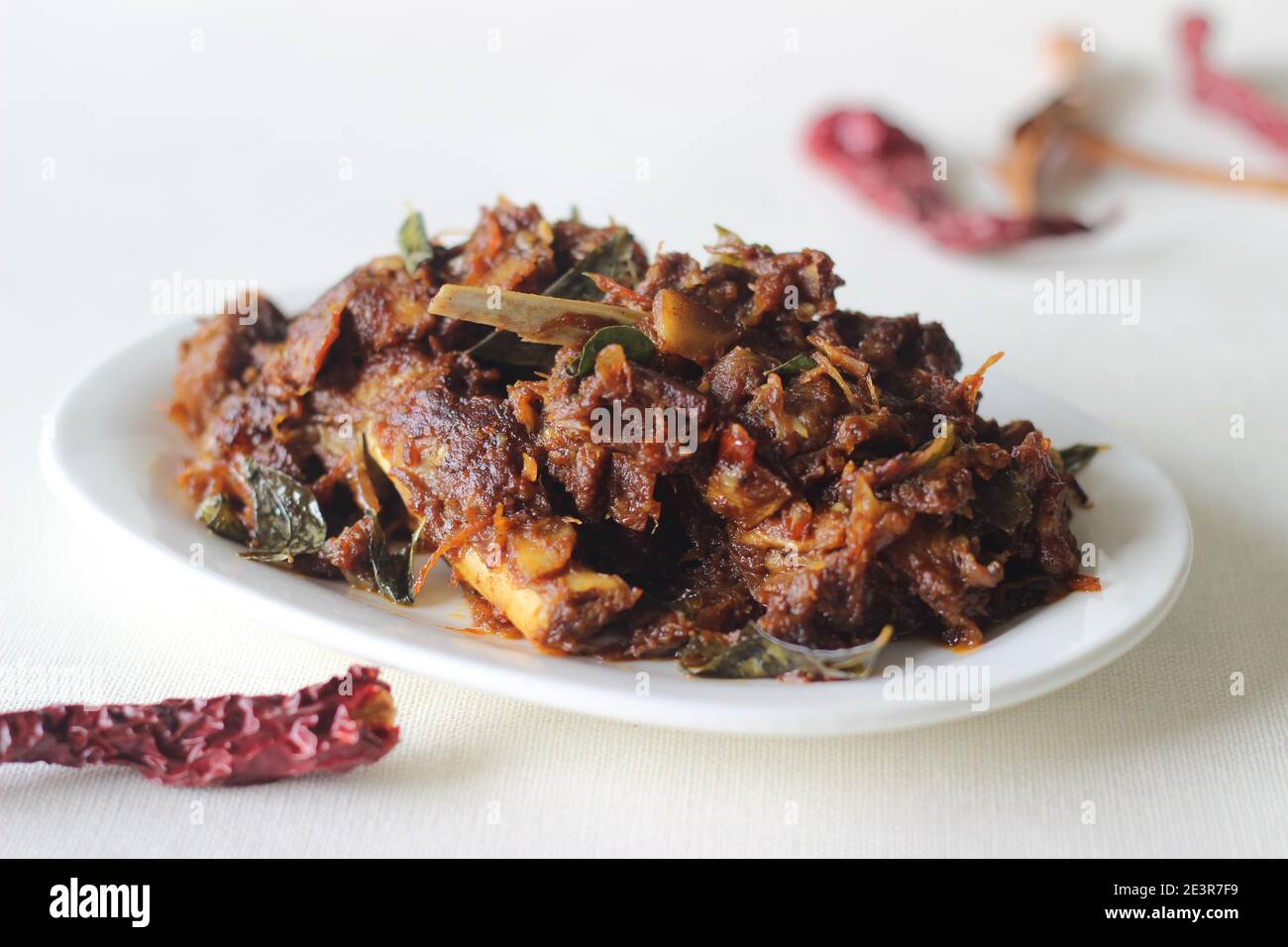 Spicy mutton roast prepared in Kerala style for special occasions like ...