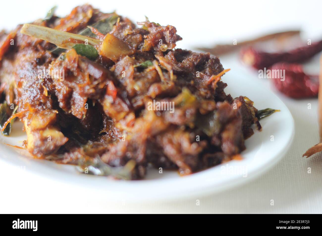 Spicy mutton roast prepared in Kerala style for special occasions like ...