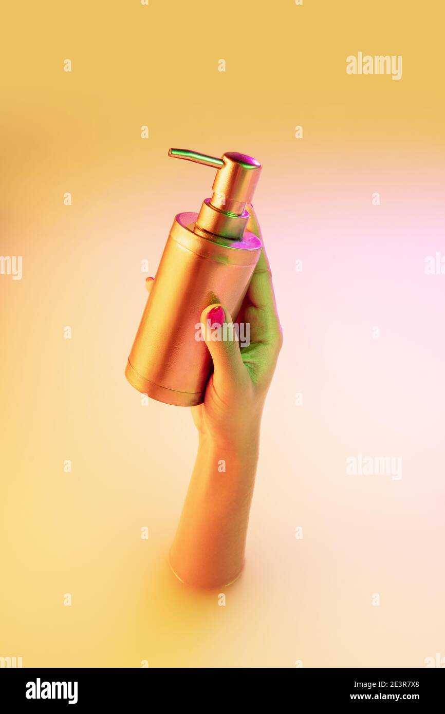 Cleaning. Close up female hand gesturing from the milk bath with soft ...