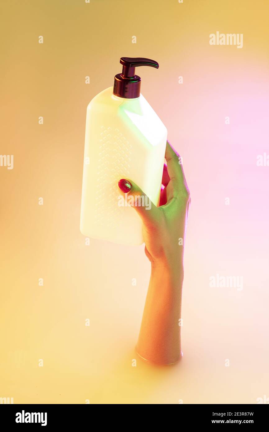 Cleaning. Close up female hand gesturing from the milk bath with soft ...