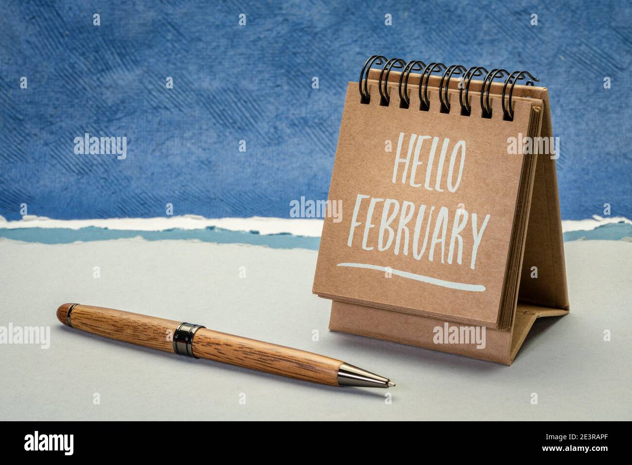 hello february greeting card - handwriting in a spiral desktop calendar ...